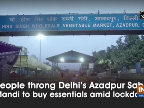 People throng Delhi's Azadpur Sabzi Mandi to buy essentials amid lockdown