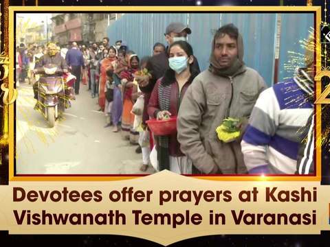 Devotees offer prayers at Kashi Vishwanath Temple in Varanasi
